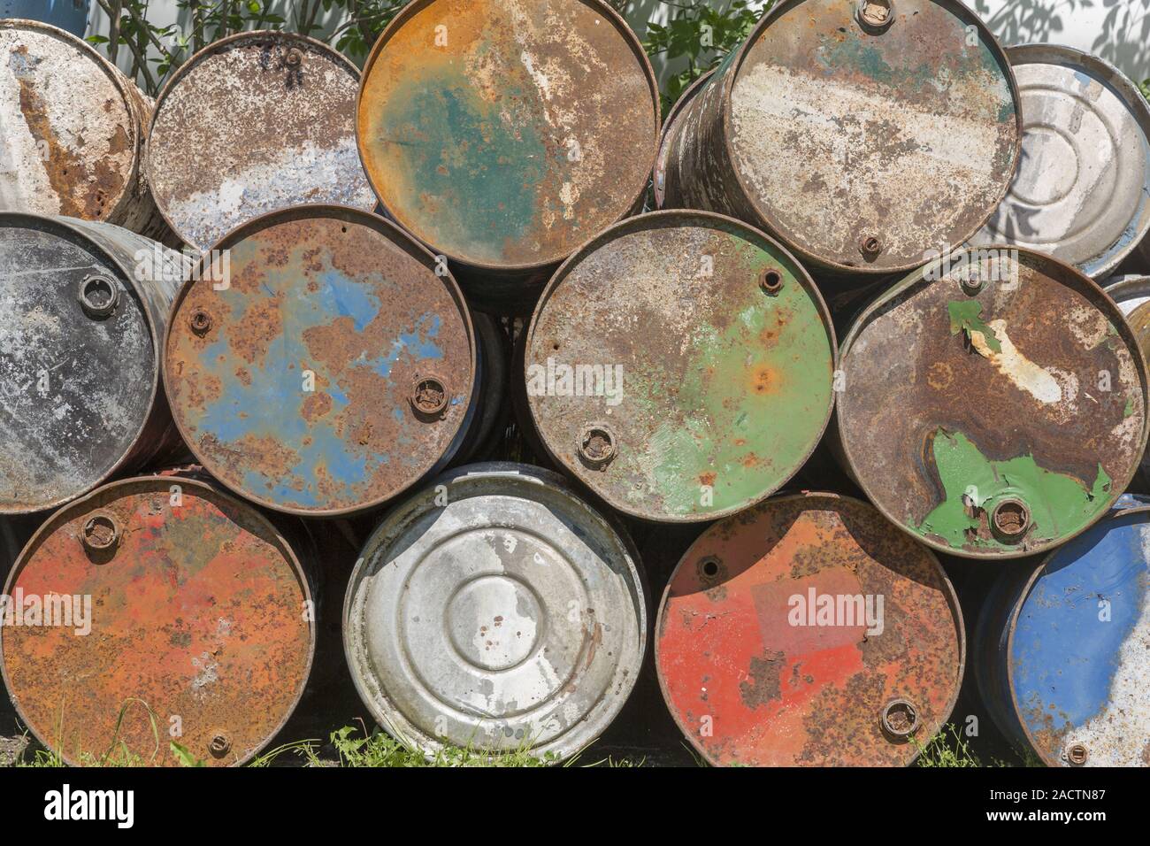Empty oil barrels, rusty and weathered Stock Photo - Alamy