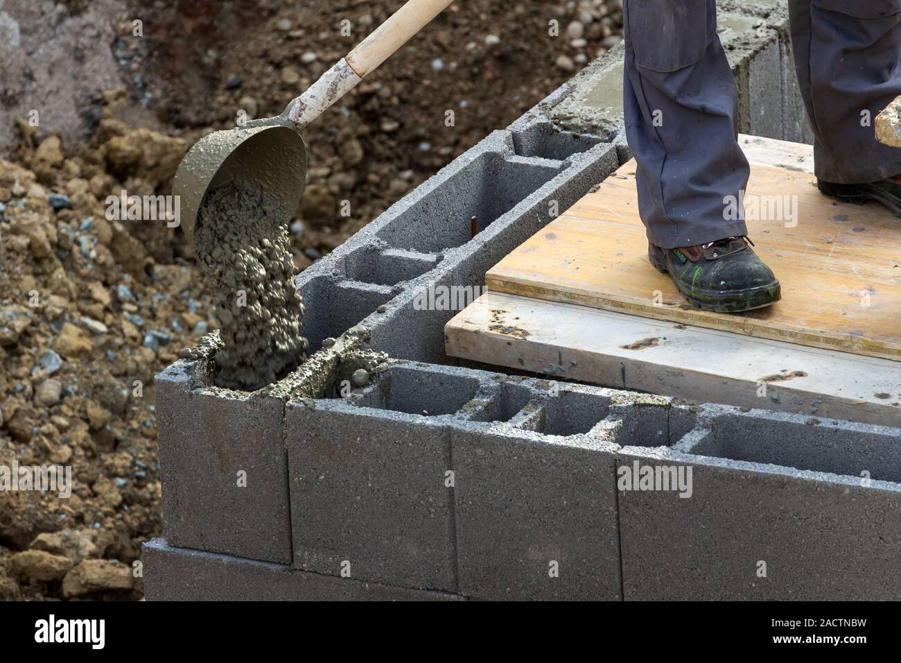 Working with concrete Stock Photo - Alamy
