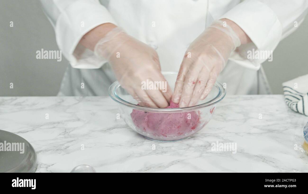 Step by step. Mixing food coloring into the cookie dough to bake red ...