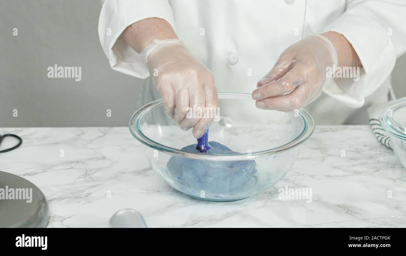 Step by step. Mixing food coloring into the cookie dough to bake red ...