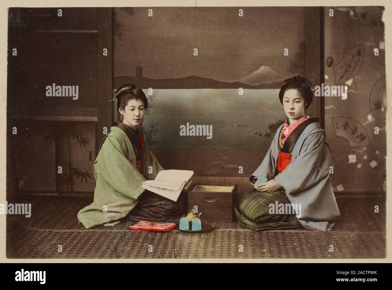 Photograph of two Japanese women sitting Stock Photo - Alamy