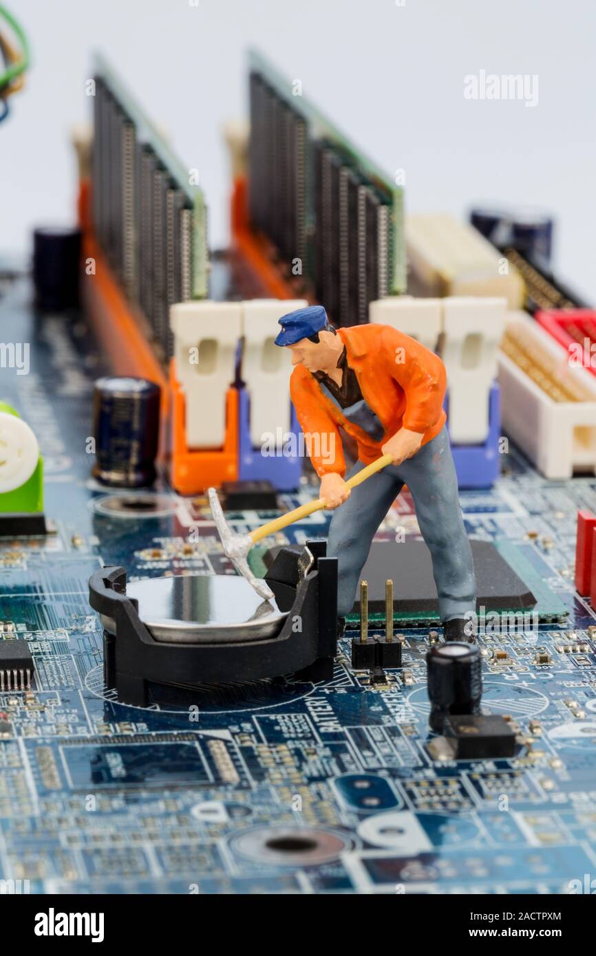 Computer board and construction worker Stock Photo - Alamy
