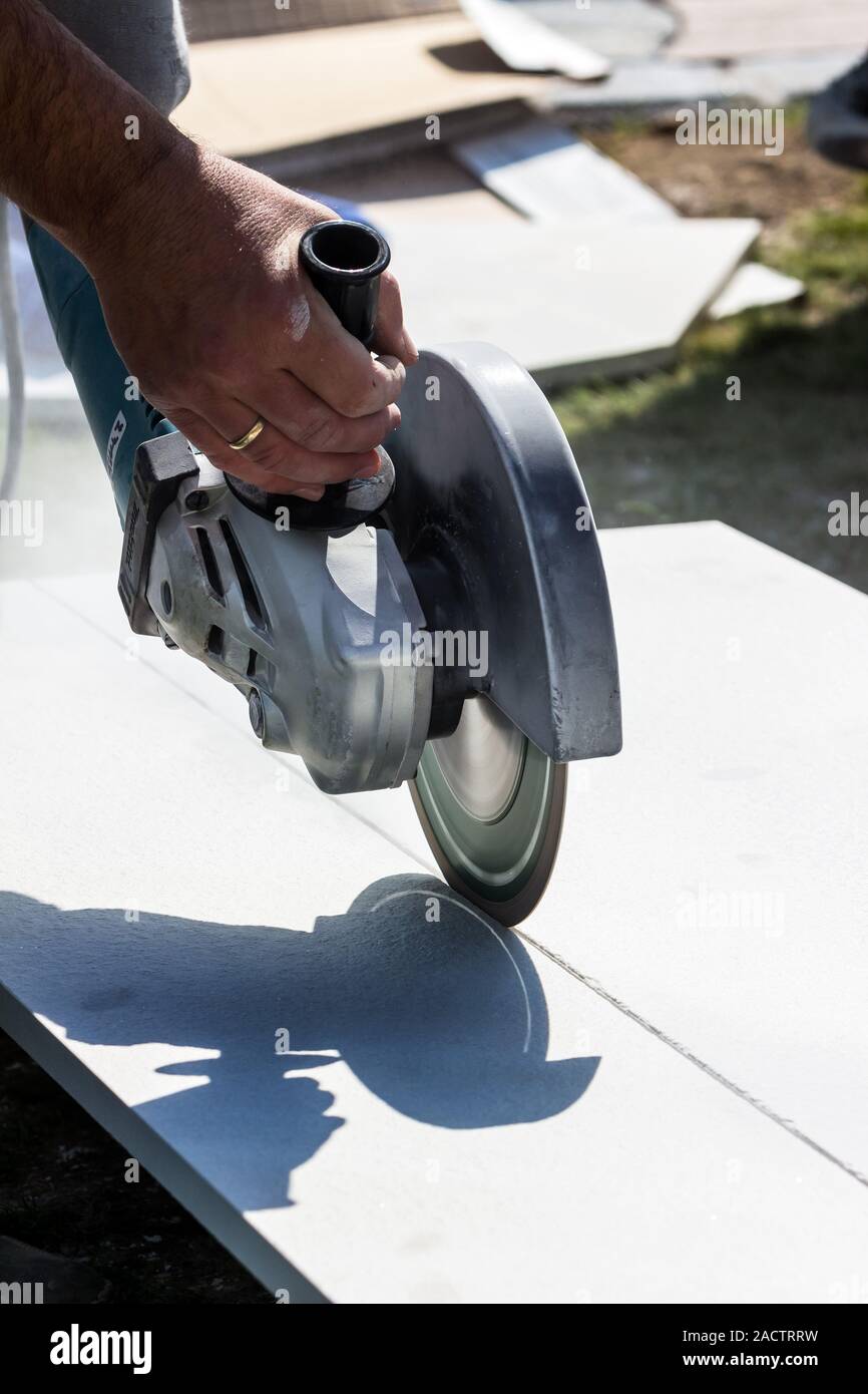 Tiler at work Stock Photo - Alamy