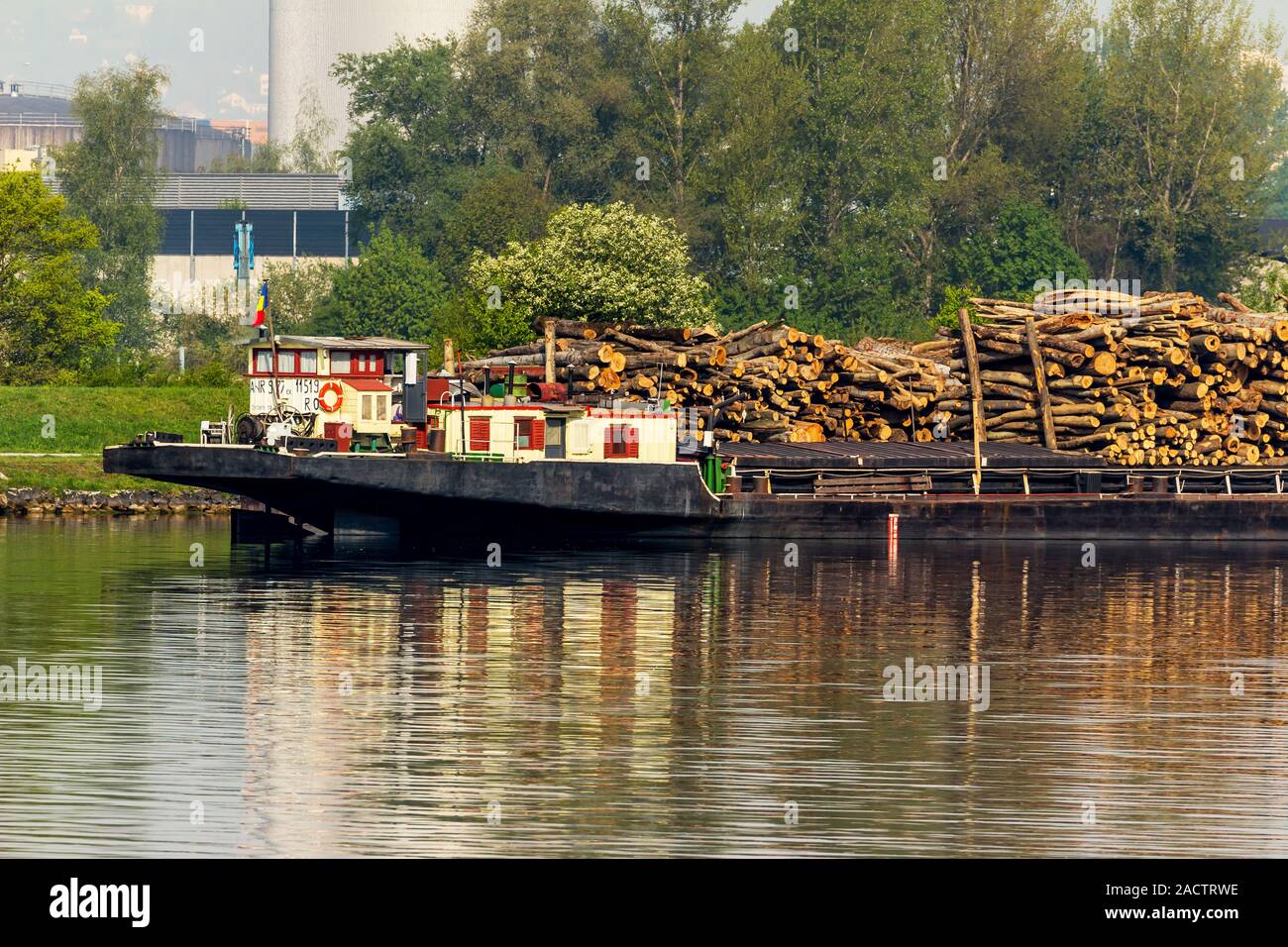Ship loaded with wood Stock Photo - Alamy