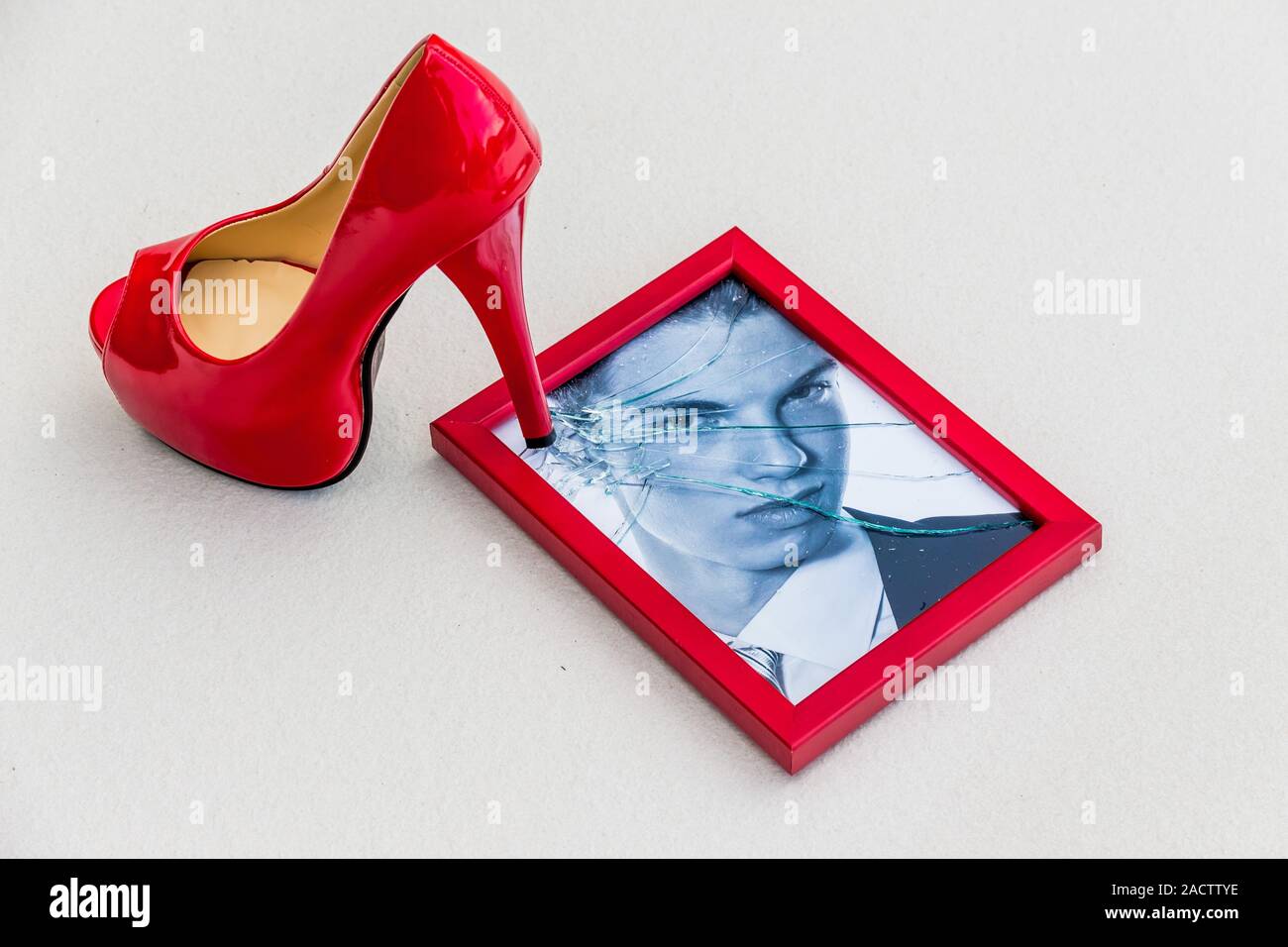 Picture frame and stiletto shoe Stock Photo - Alamy