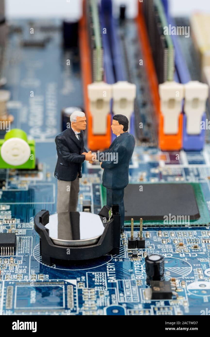 Two managers on computer board Stock Photo - Alamy