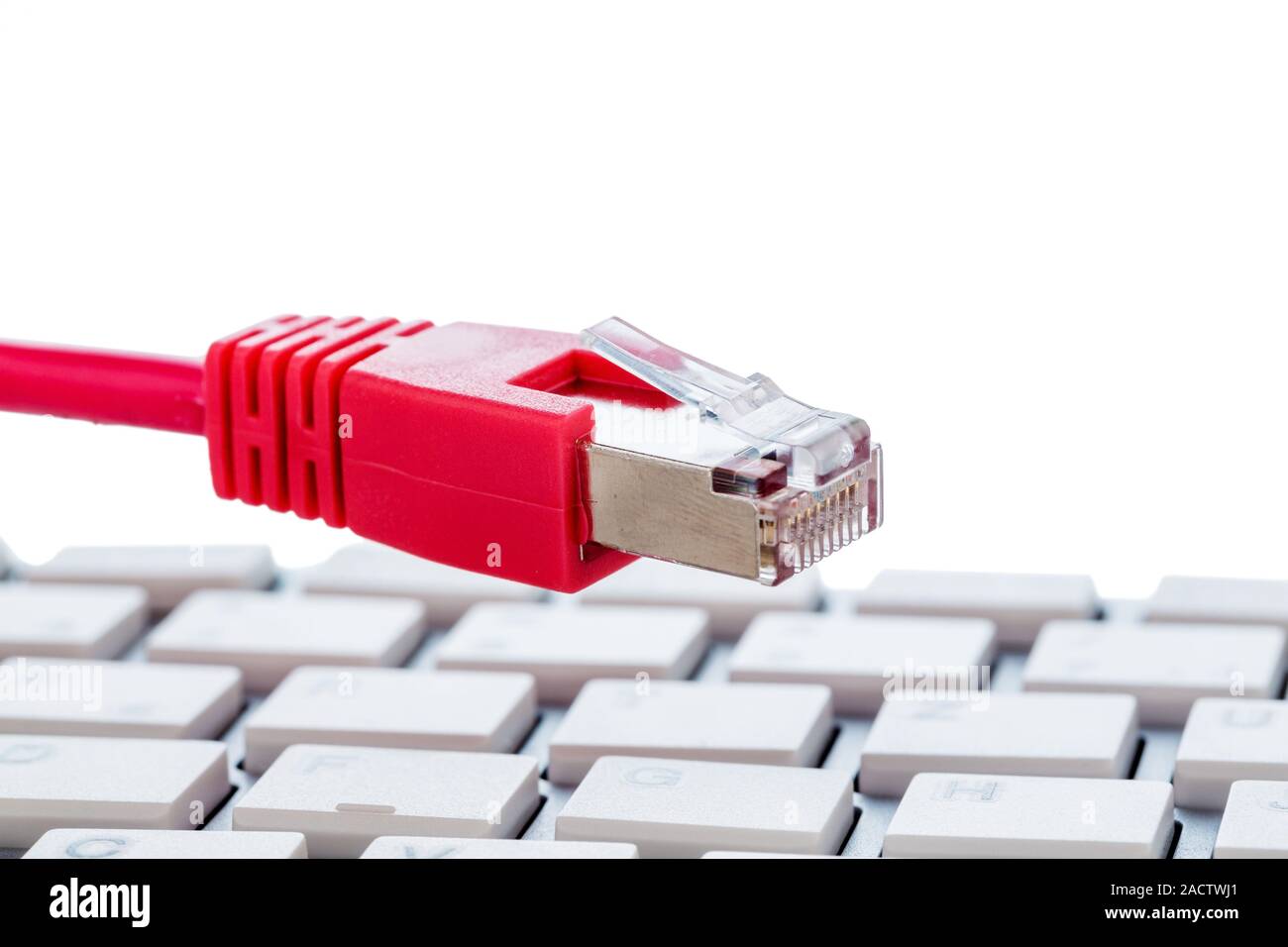 Network cable to keyboard Stock Photo - Alamy