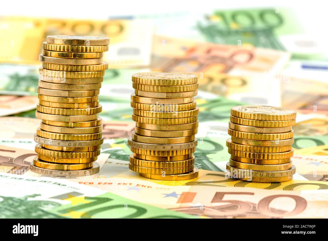 Stack of money coins, sinking curve Stock Photo - Alamy