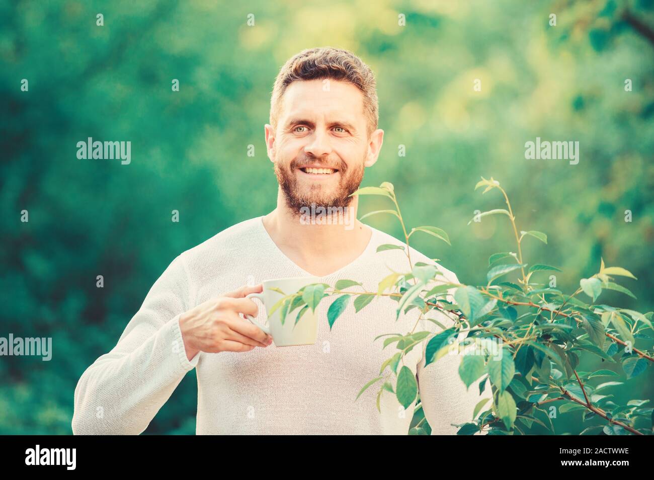 ecological life for man. man in green forest. morning coffee. healthy ...