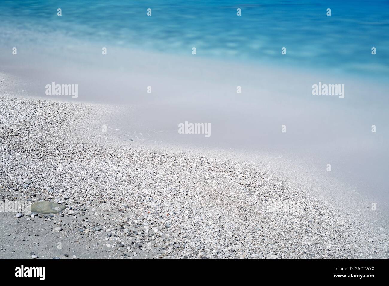 Long time exposure at the pebble beach, Greece Stock Photo - Alamy
