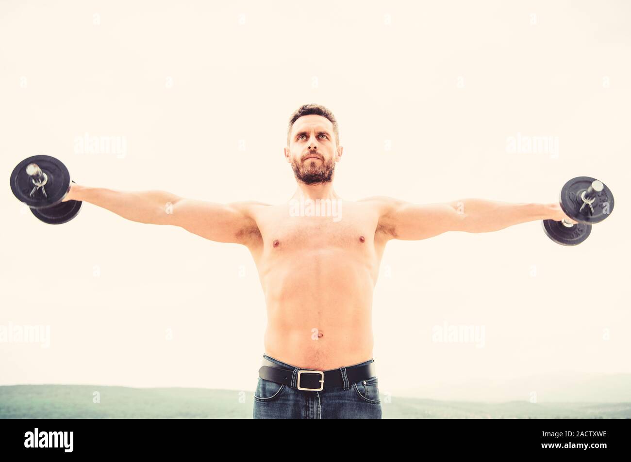 Hustle to gain more muscle. Healthy mind in healthy body. Muscular man ...