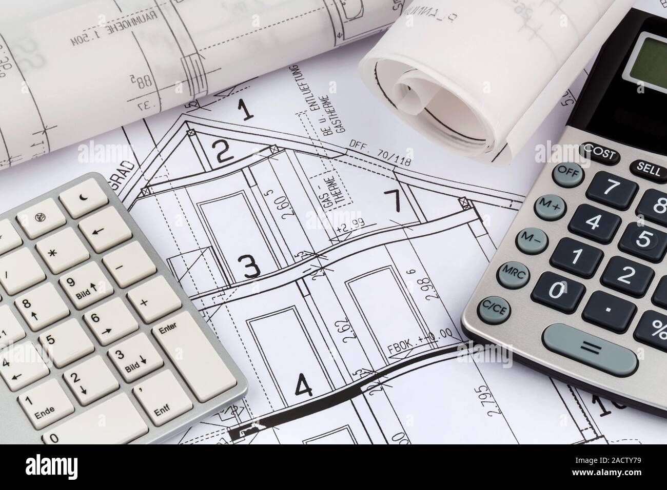 House plan with pocket calculator Stock Photo - Alamy