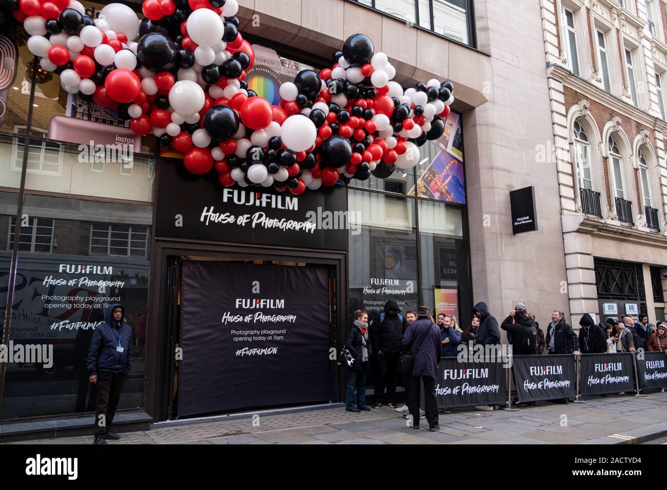 The queues outside the launch of the Fuji store Stock Photo - Alamy
