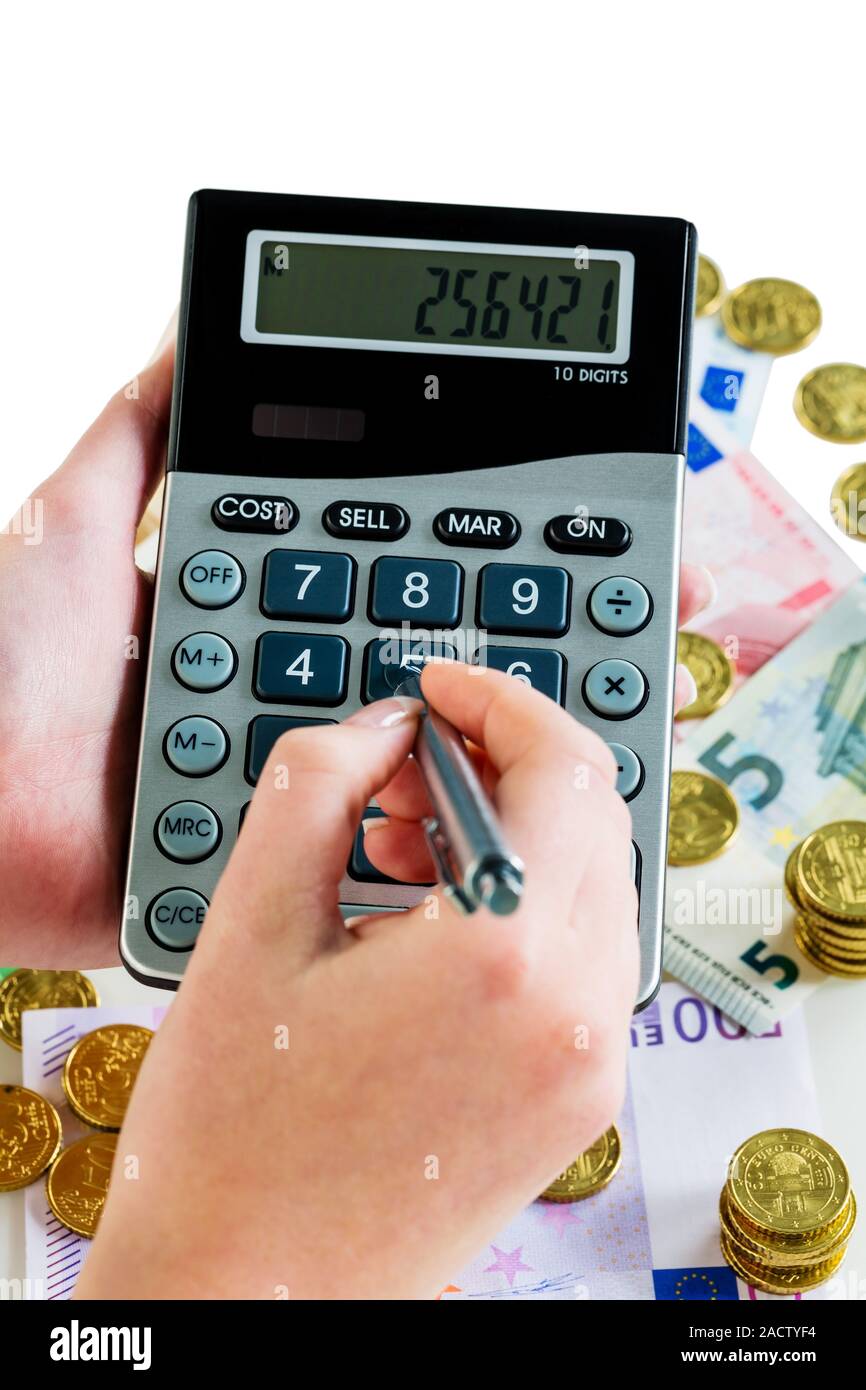 Hand with calculator hi-res stock photography and images - Alamy