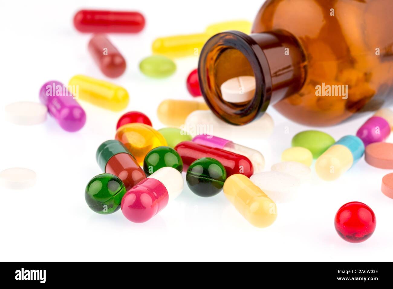 Many tablets with container Stock Photo - Alamy