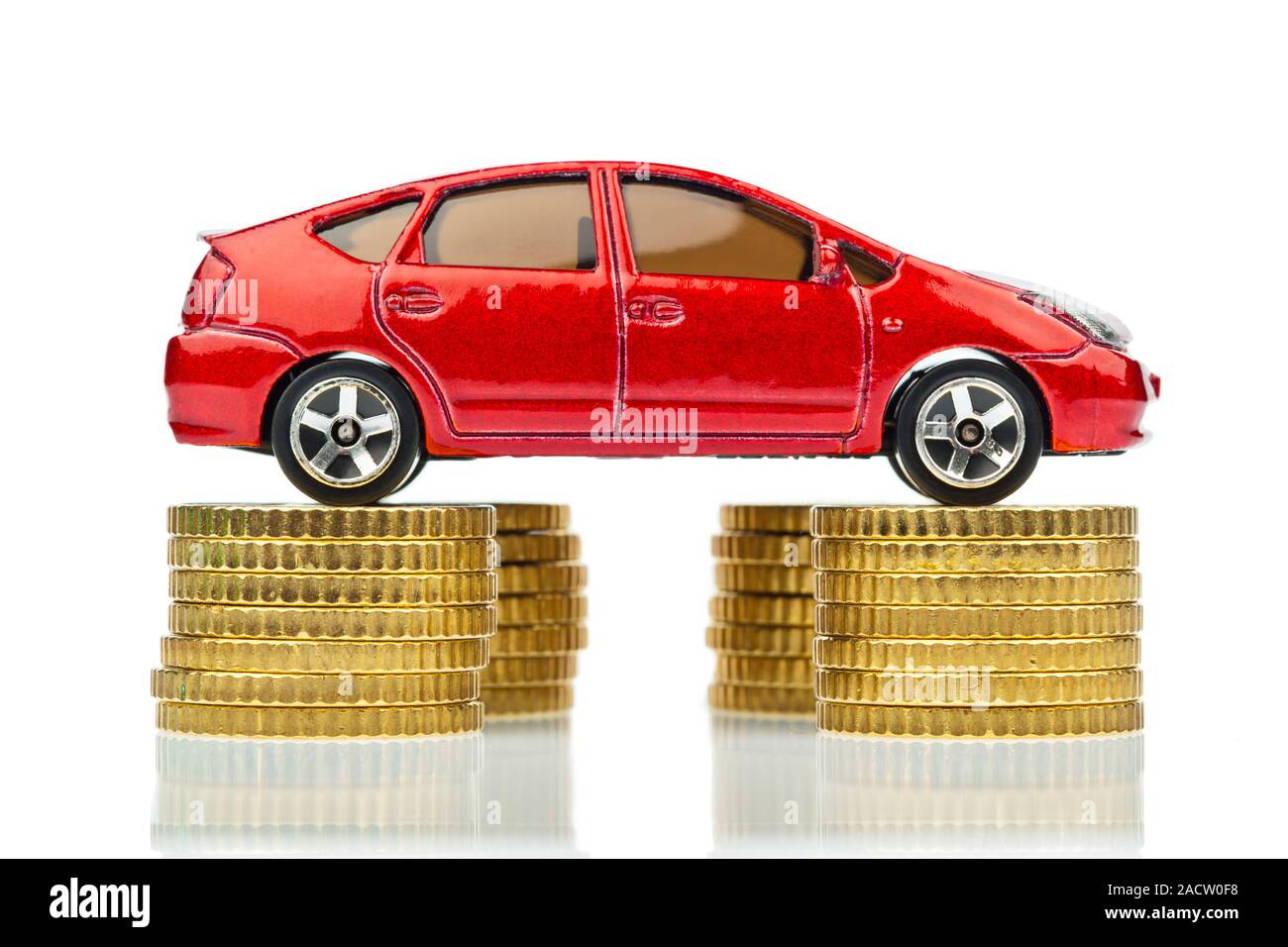 Car and coins. Rising car costs Stock Photo - Alamy
