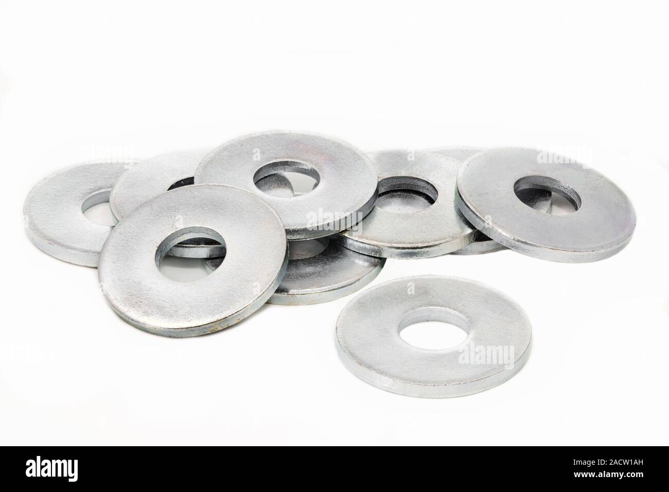 Washers on white background Stock Photo - Alamy