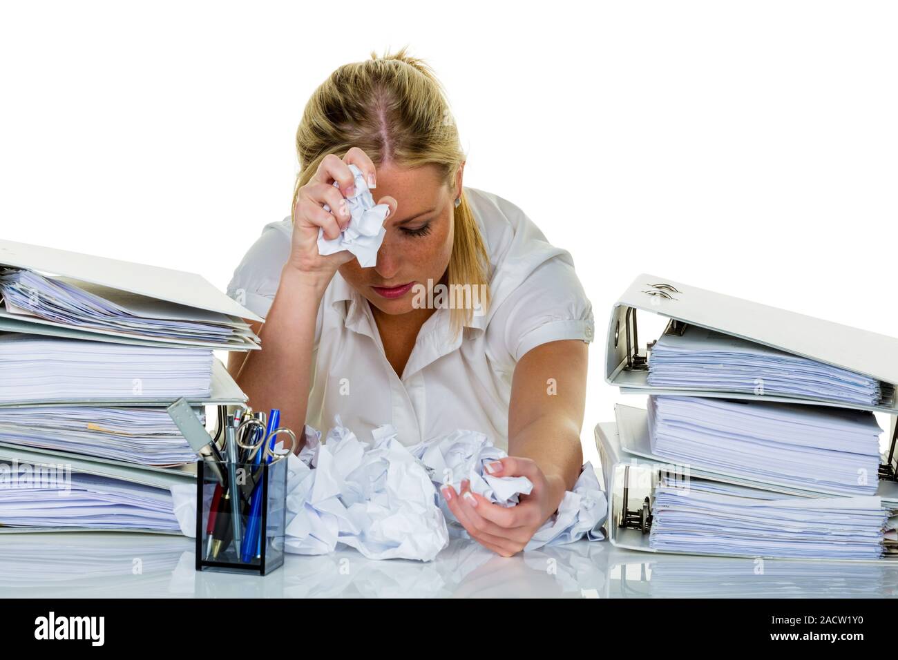 Woman in office with burnout Stock Photo - Alamy