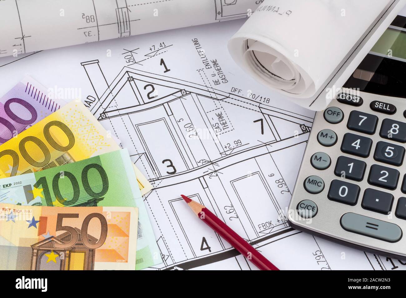 House plan with pocket calculator Stock Photo - Alamy