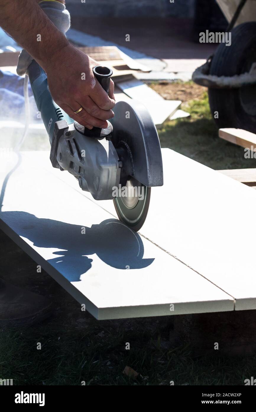 Tiler at work Stock Photo - Alamy