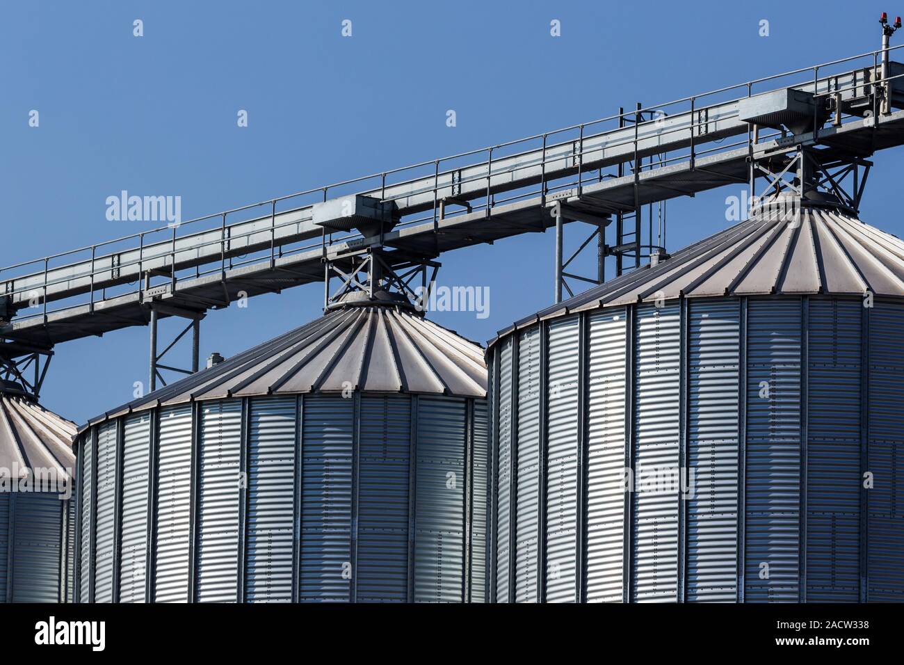 Silos in a warehouse Stock Photo - Alamy