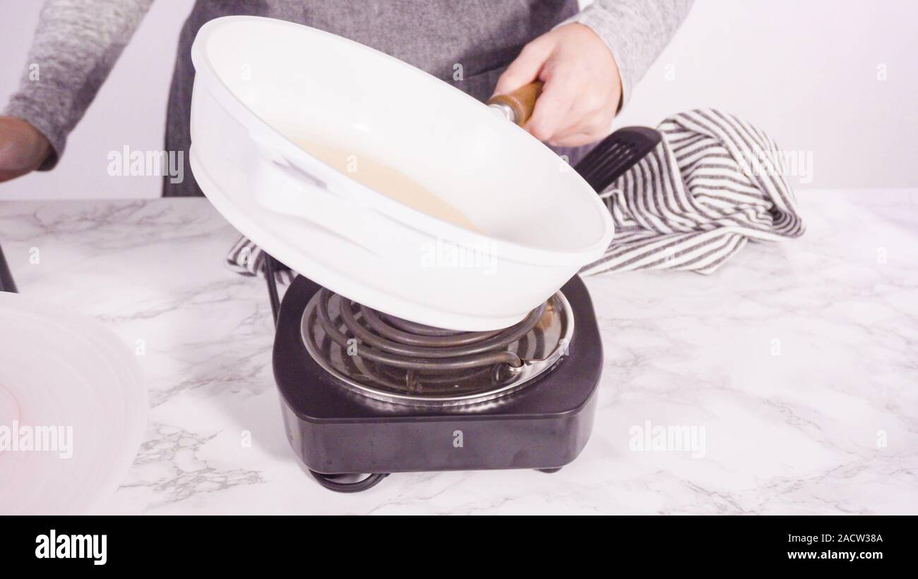 Making crepes in a small frying pan over medium heat Stock Photo - Alamy