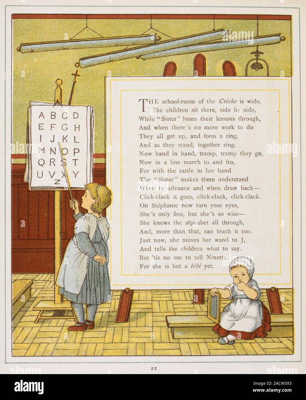 A child learning the alphabet in a classroom of a creche. Colour ...