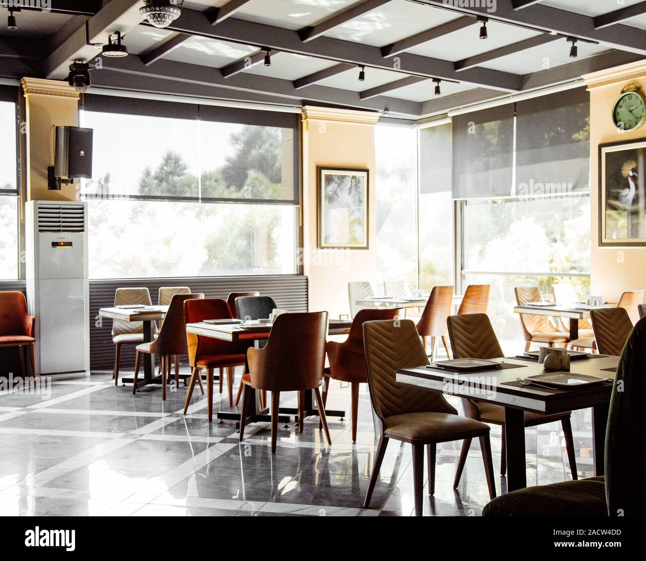 cozy cafe in pleasant colors with stained-glass windows Stock Photo - Alamy