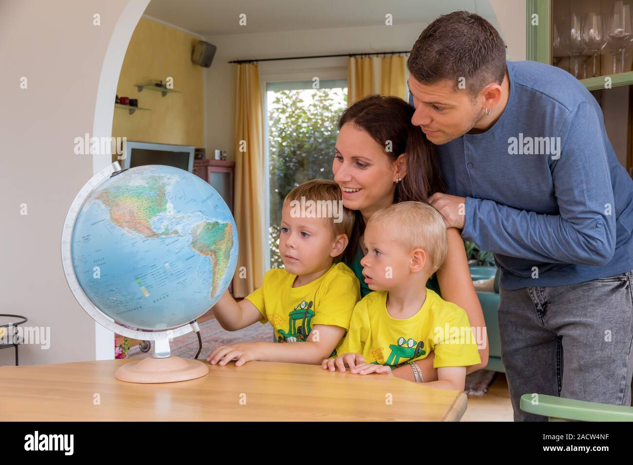 Family Plans Holiday Trip Stock Photo Alamy