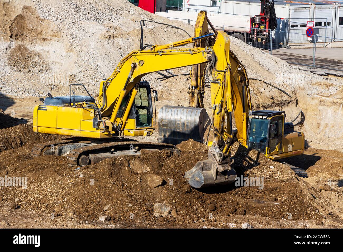 Excavator on construction site during earthworks Stock Photo - Alamy