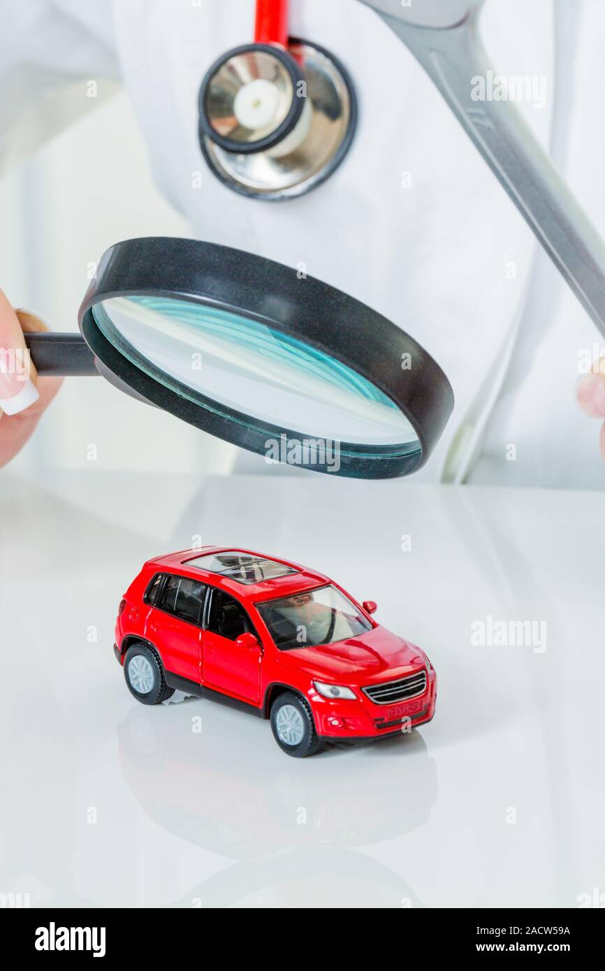 Car is examined by doctor Stock Photo - Alamy