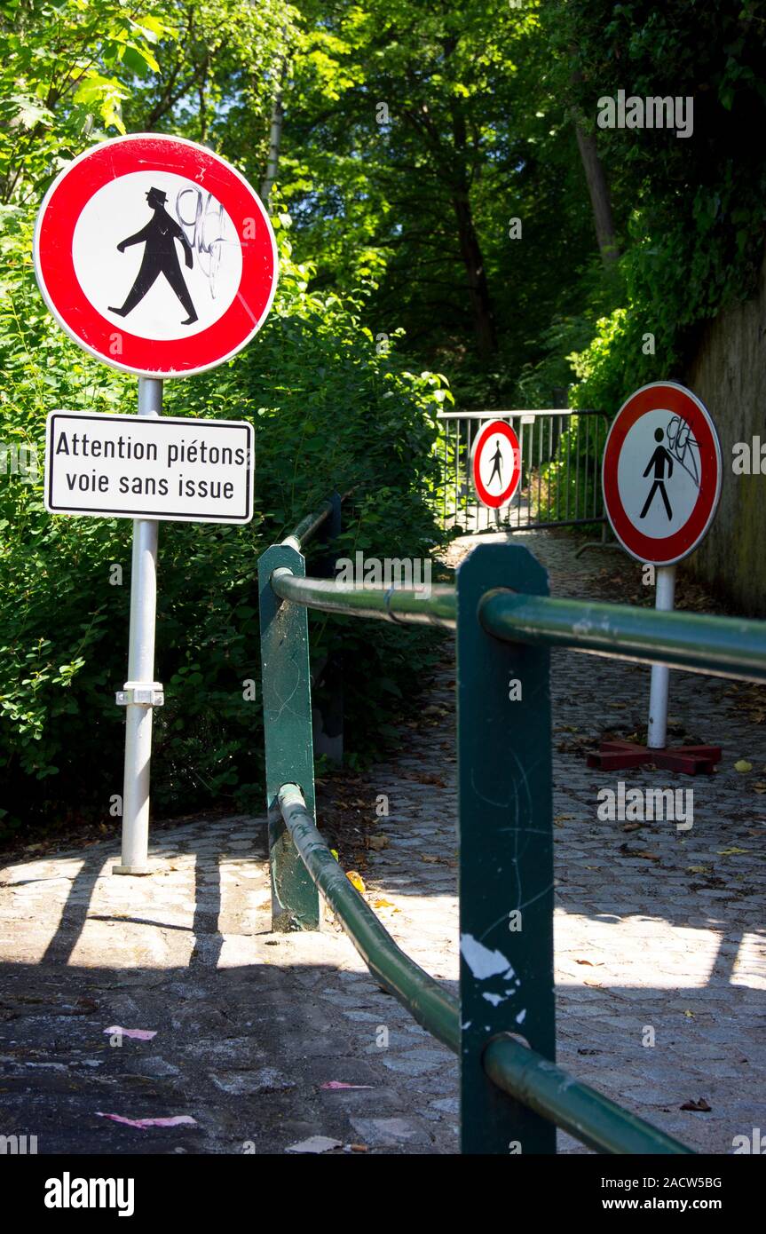 Signs in Luxembourg warning pedestrians of a blocked path (no way out ...
