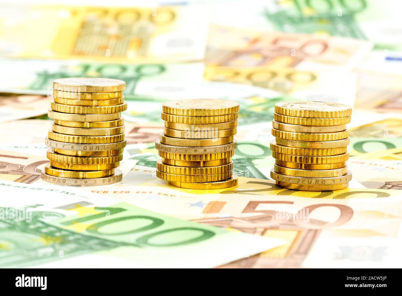 Three stacks of money coins Stock Photo - Alamy