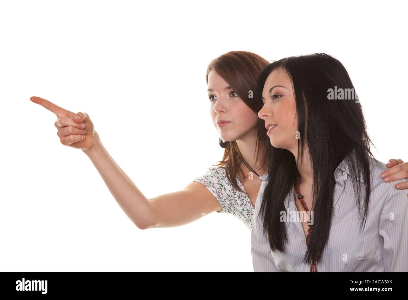 Two young women burst into laughter Stock Photo - Alamy