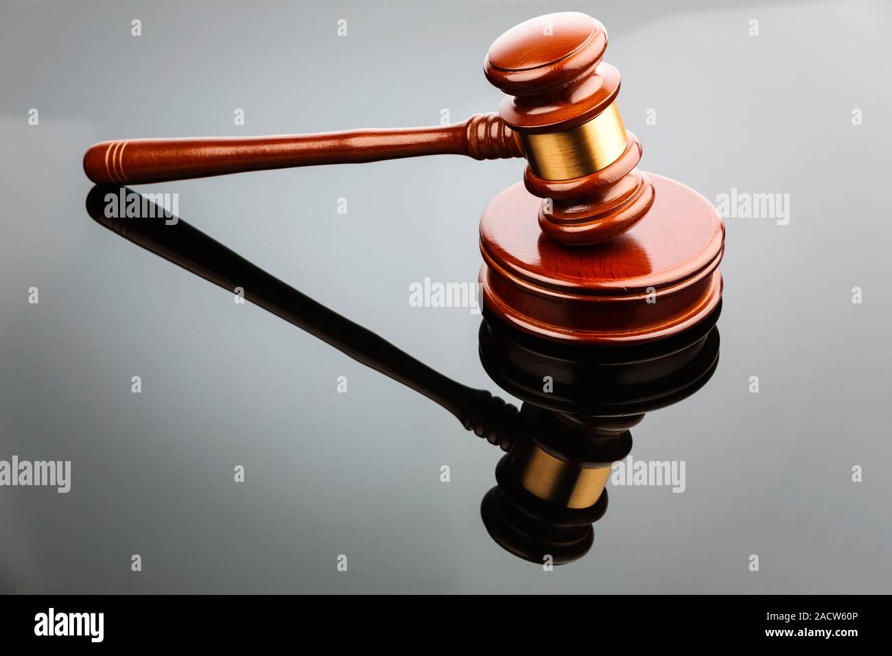 Auction hammer reflects itself Stock Photo - Alamy
