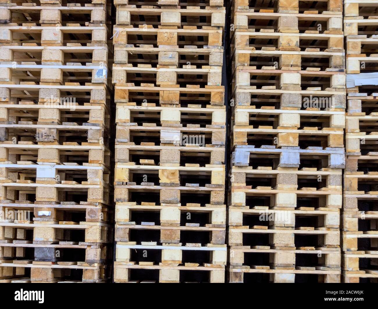 Stacked transport pallets Stock Photo - Alamy