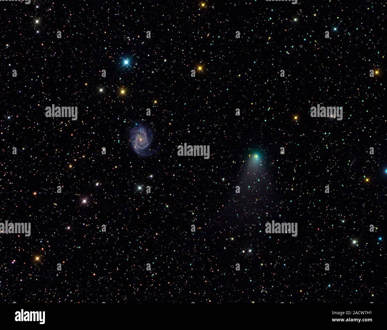 Galaxy NGC 2997 and comet C/2012 V2 (LINEAR). Comets are bodies of ice ...