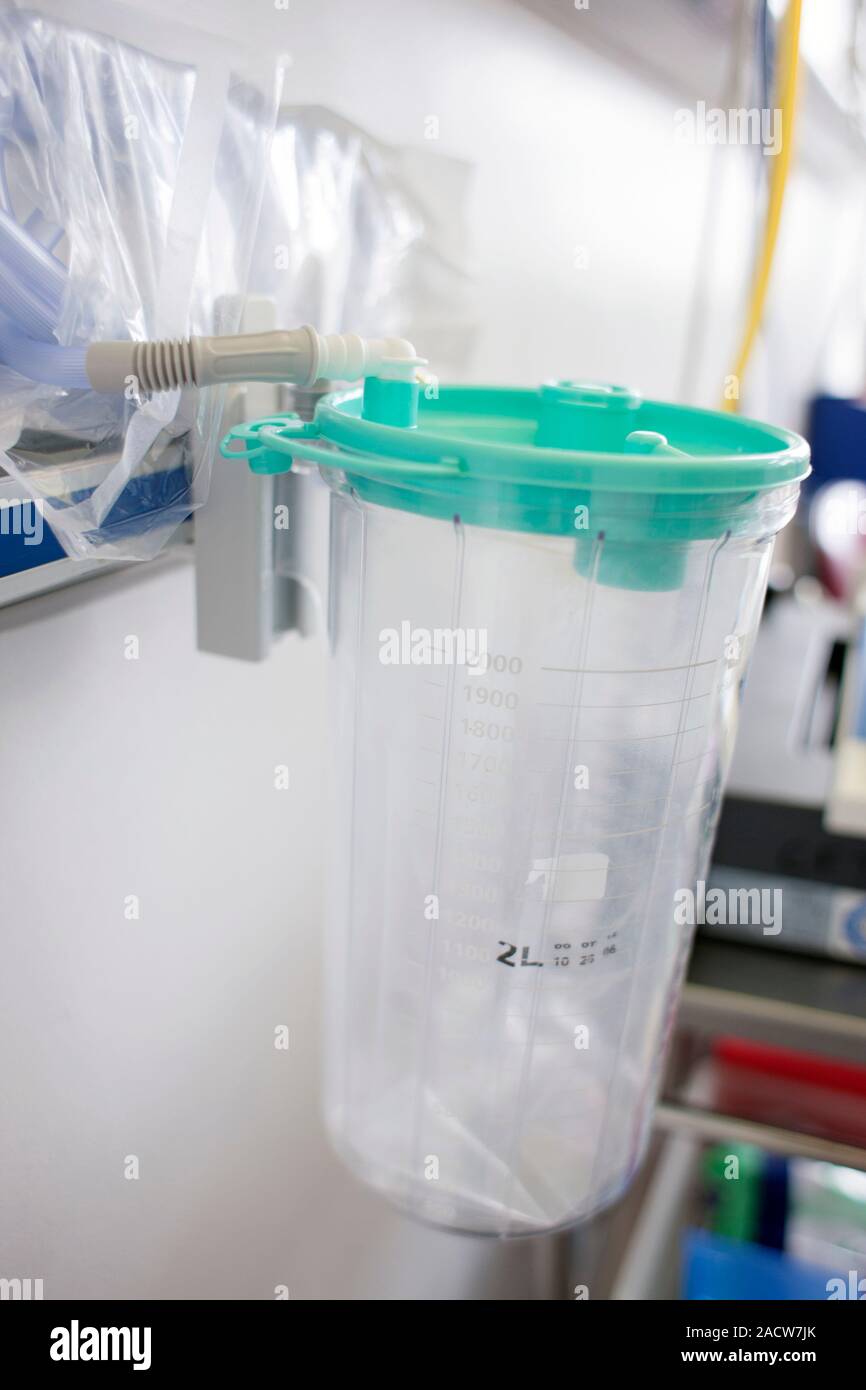 Vacuum suction unit container on the wall of a hospital treatment room ...
