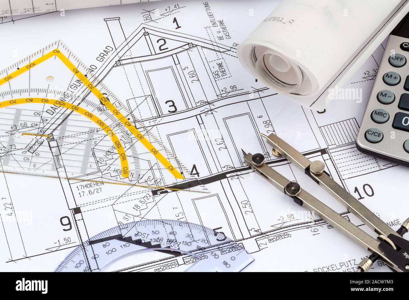 House plan with pocket calculator Stock Photo - Alamy