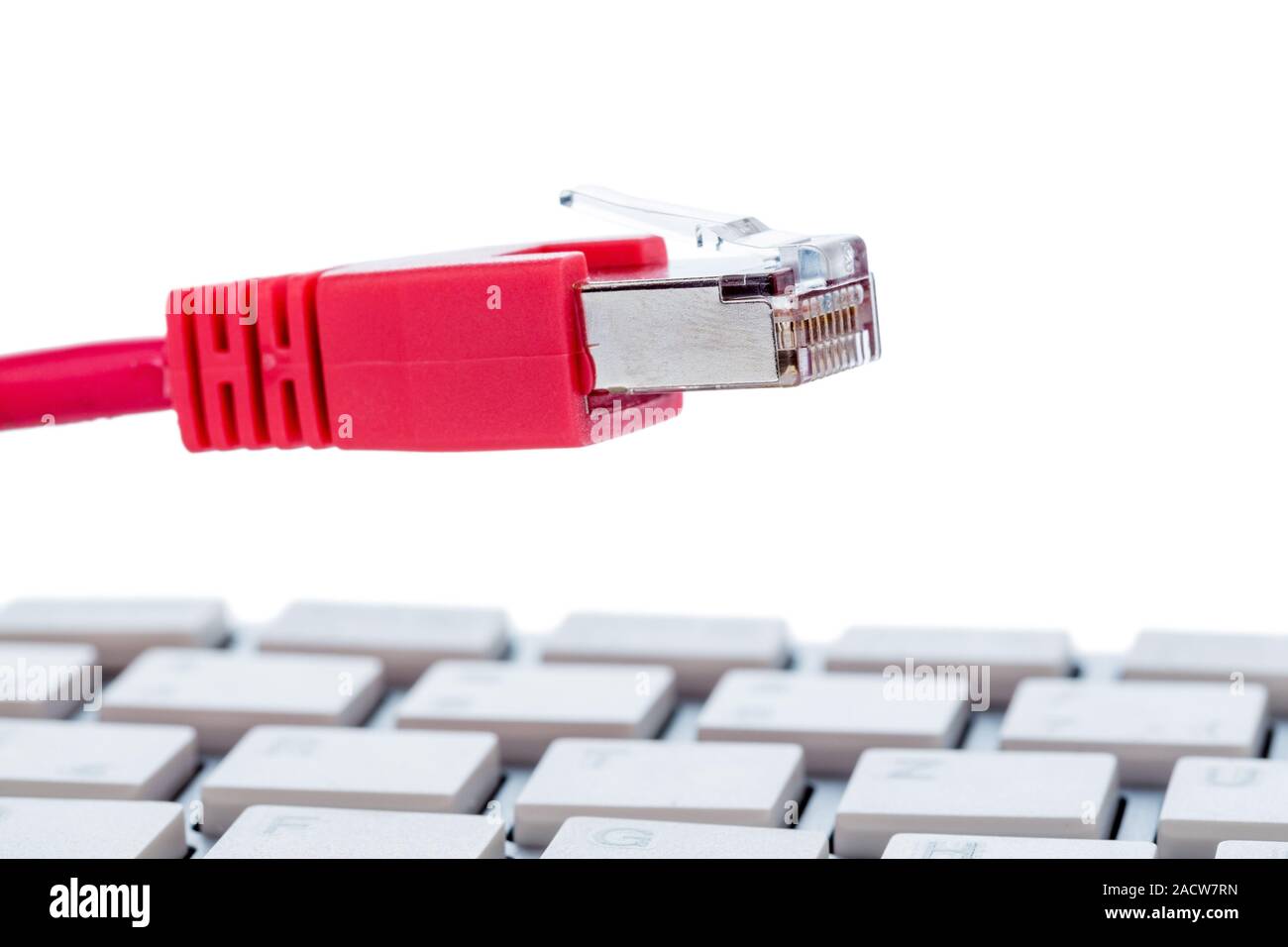 Network cable to keyboard Stock Photo - Alamy