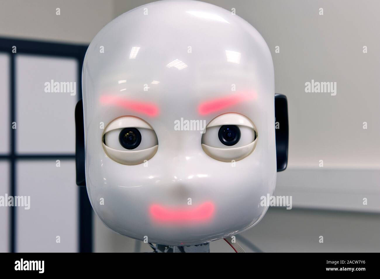 iCub robot. Close-up of the head of an iCub robot, showing its humanoid ...