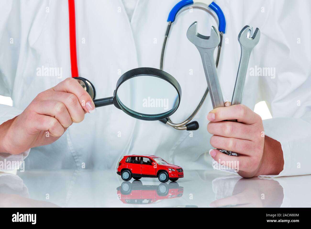 Car is examined by doctor Stock Photo - Alamy