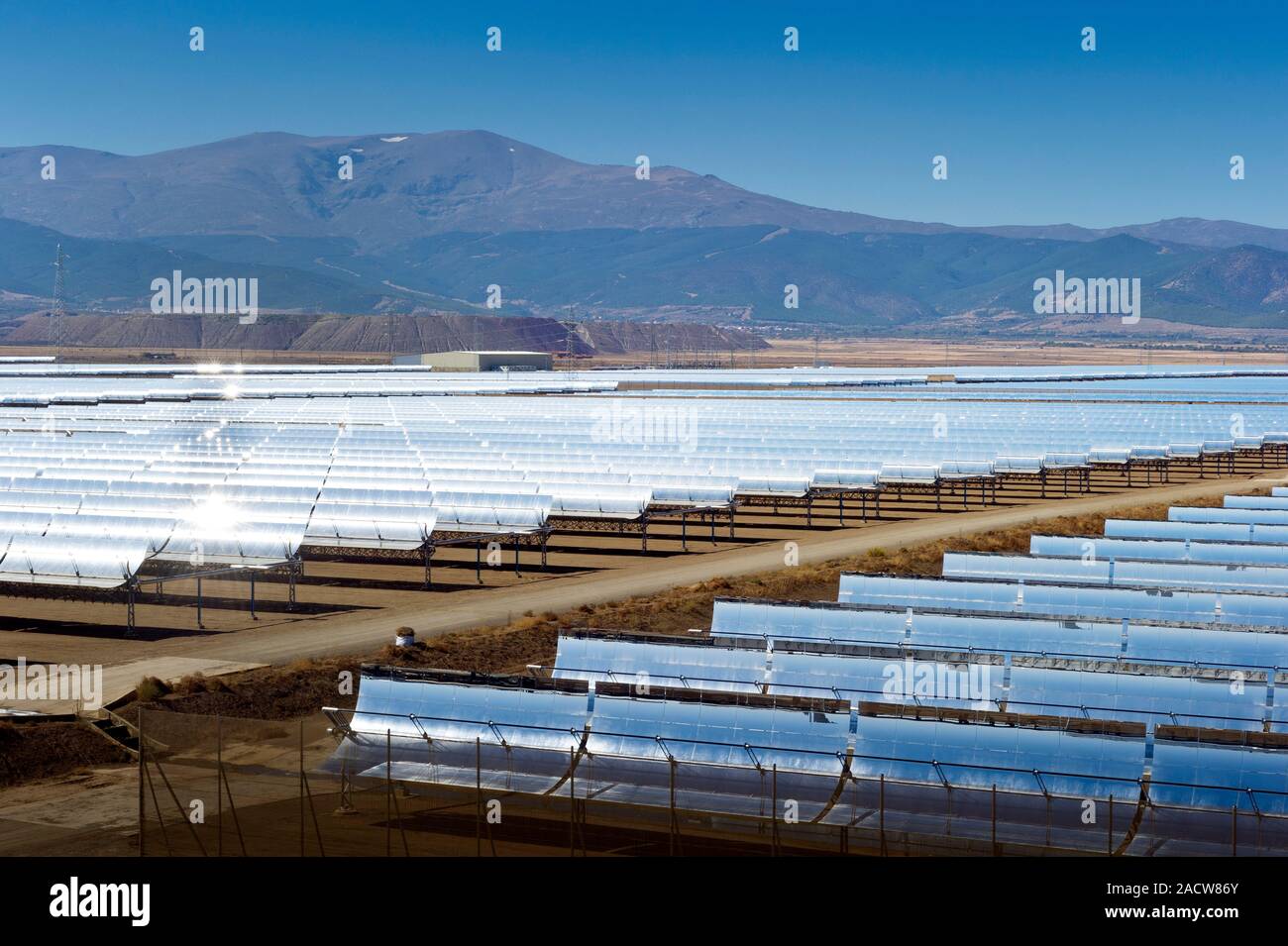 Parabolic trough solar power plant. View over the parabolic mirror ...