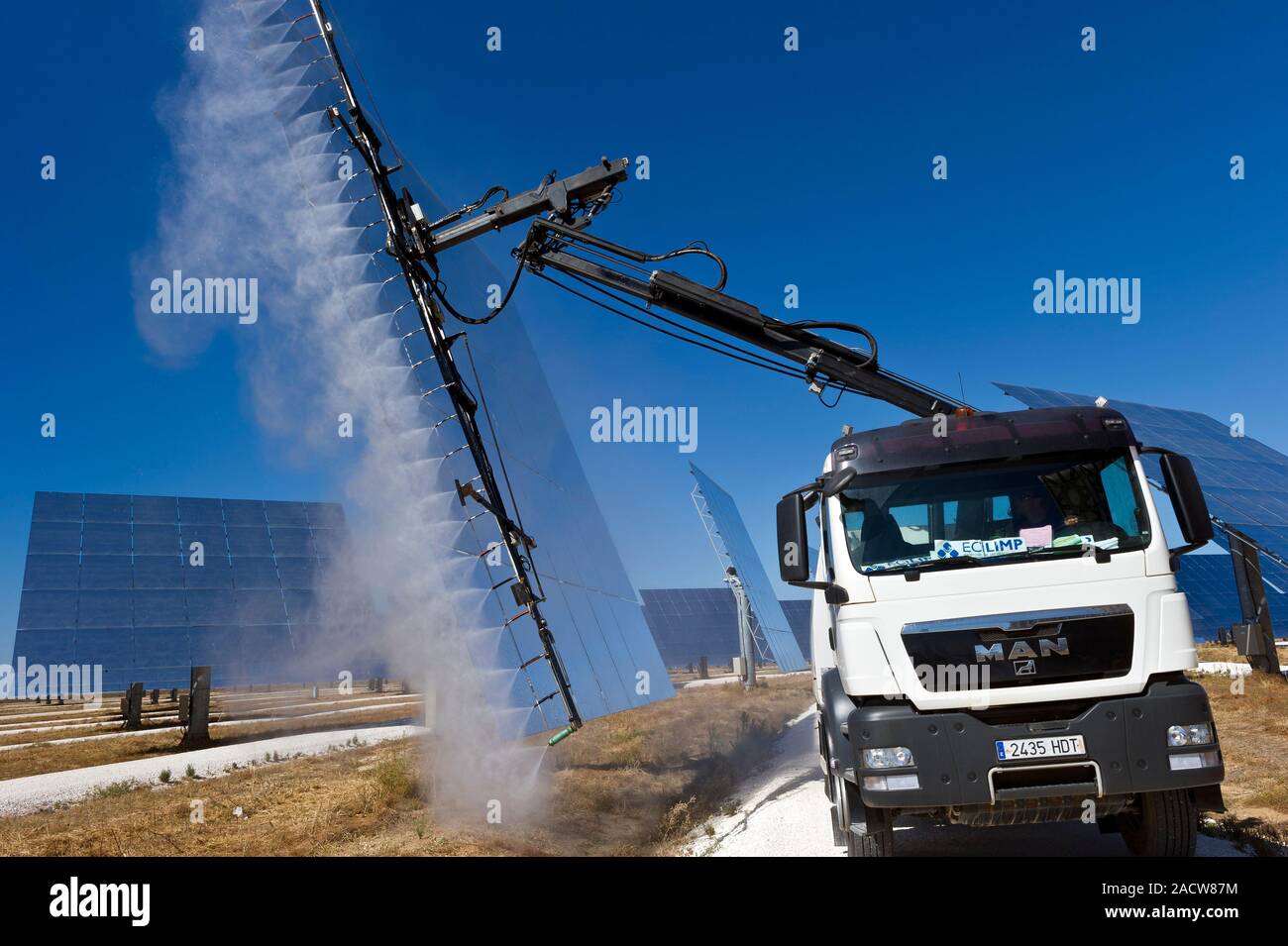 Concentrating solar power plant. Washing a heliostat array at the ...