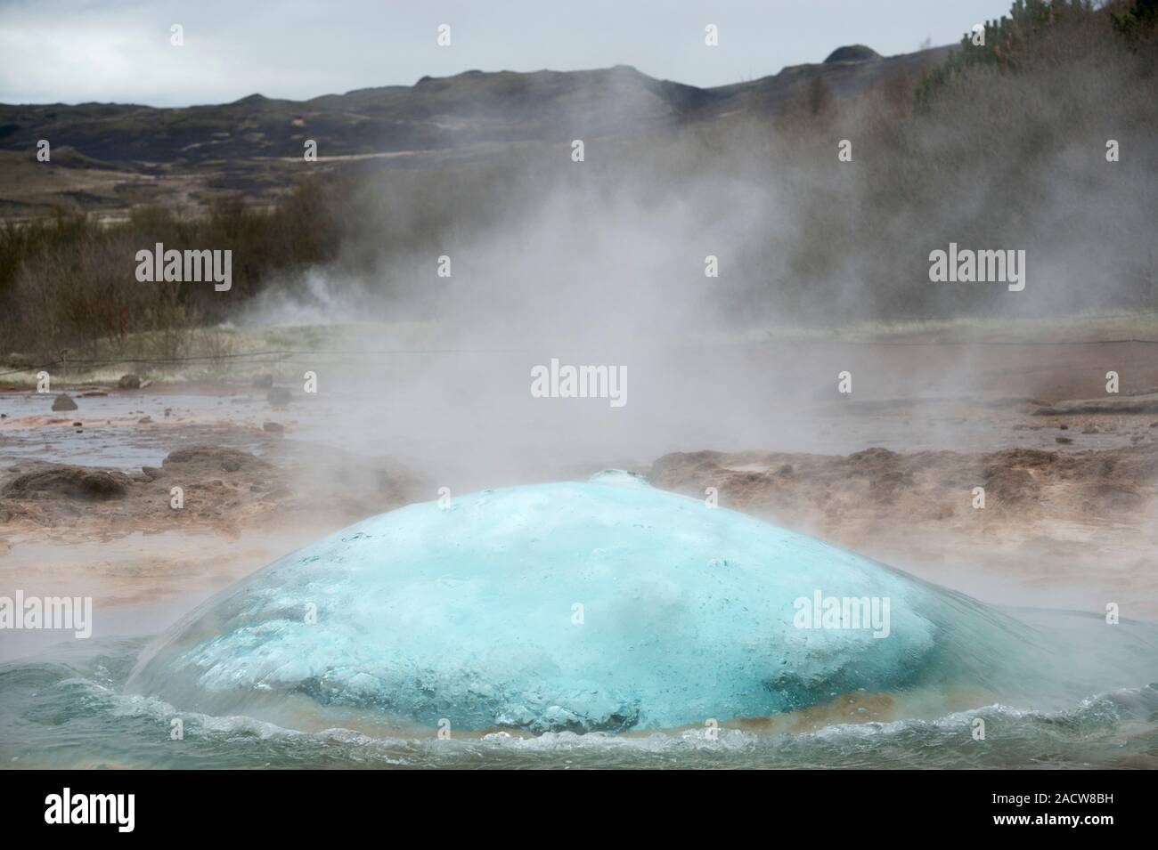 Geyser erupting. A geyser is a hot spring that periodically ejects ...