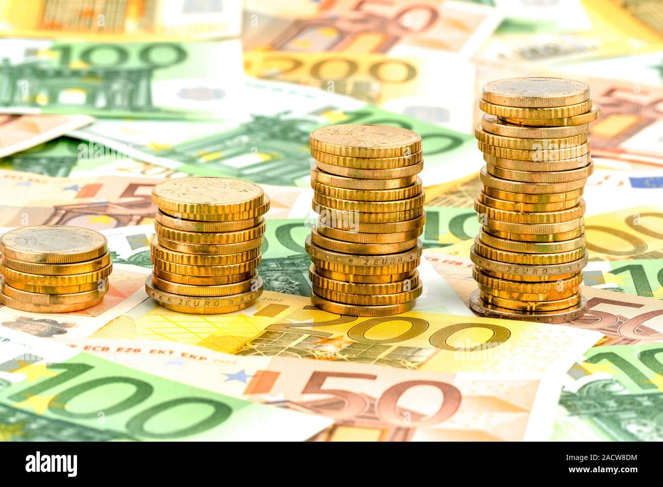 stack of money coins, rising curve Stock Photo - Alamy