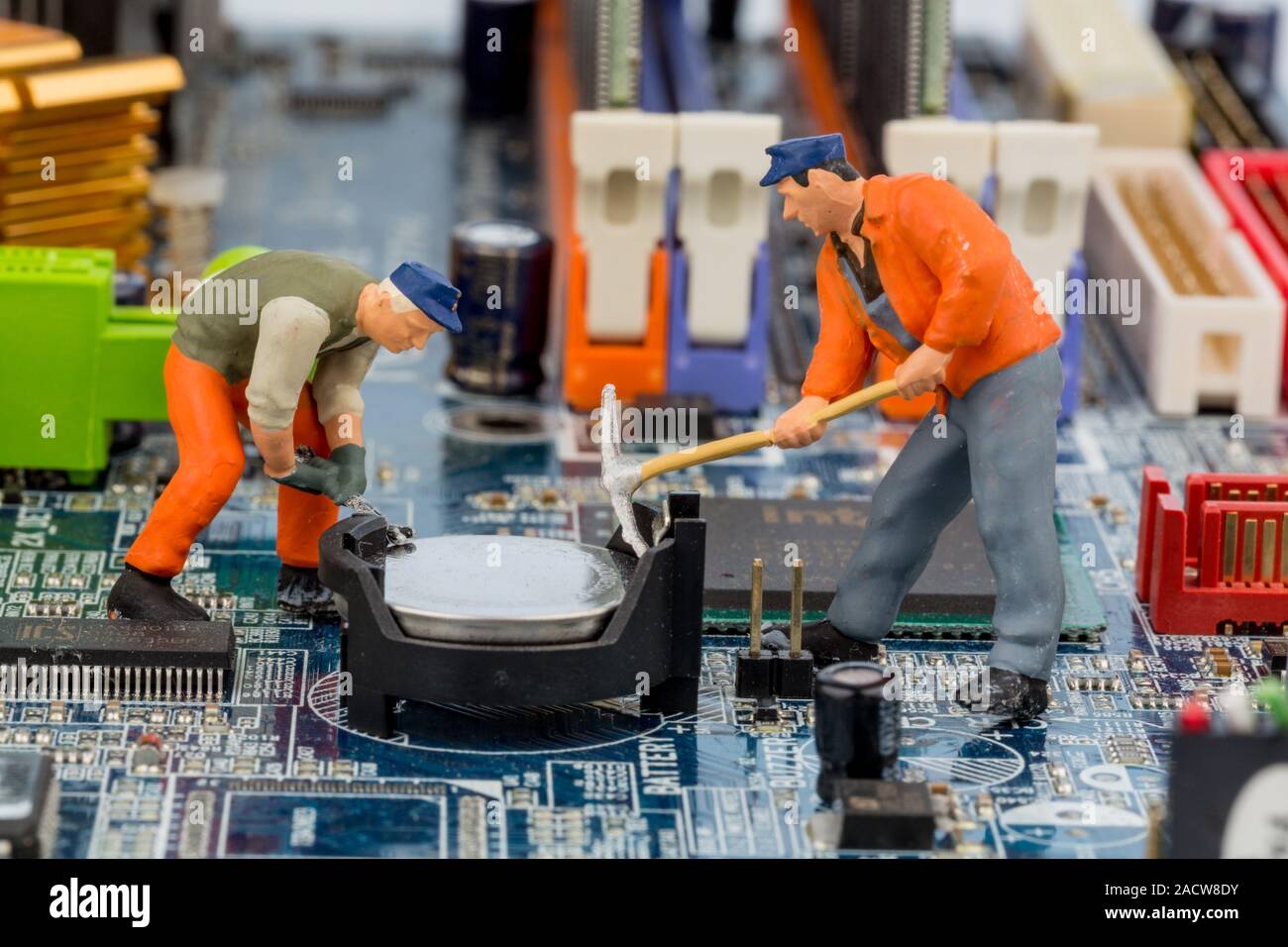 Computer board and construction worker Stock Photo - Alamy