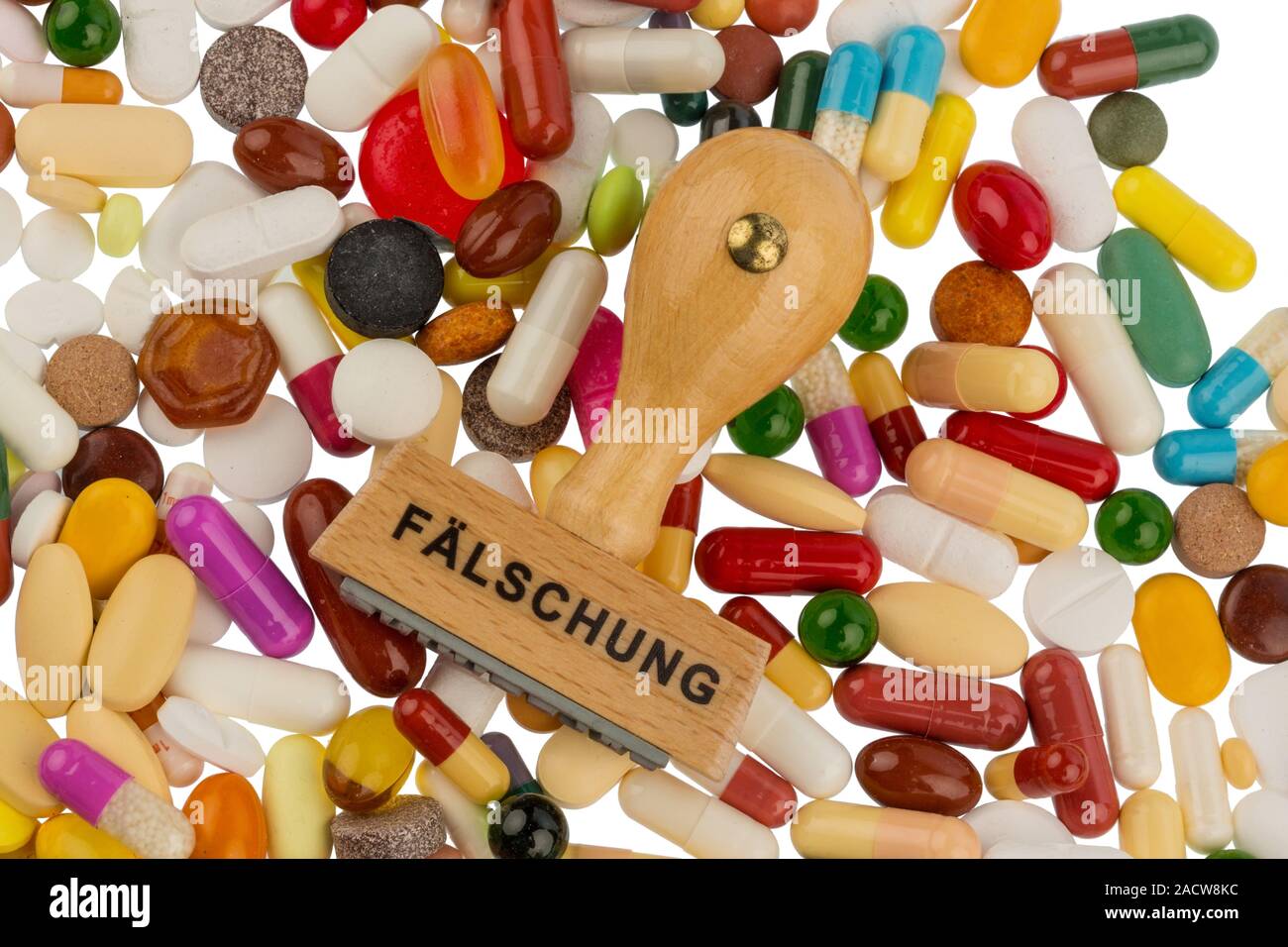 Stamps on coloured tablets Stock Photo - Alamy