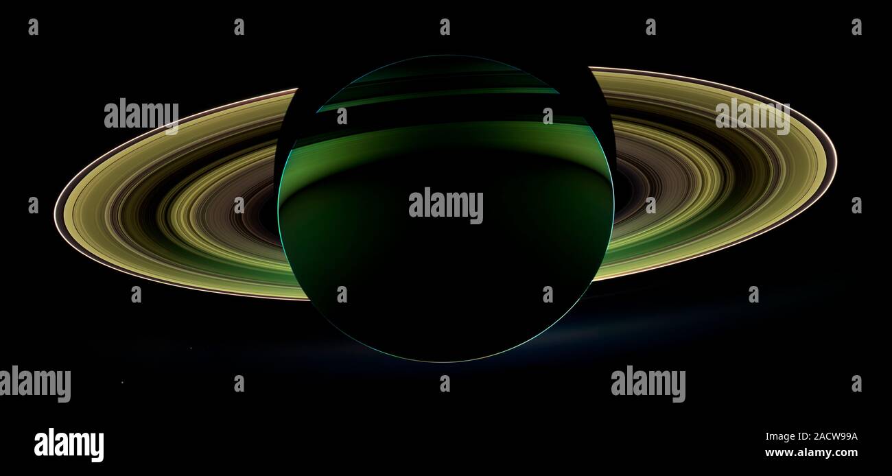 Saturn. Backlit view of the planet Saturn and its rings, taken by NASA ...