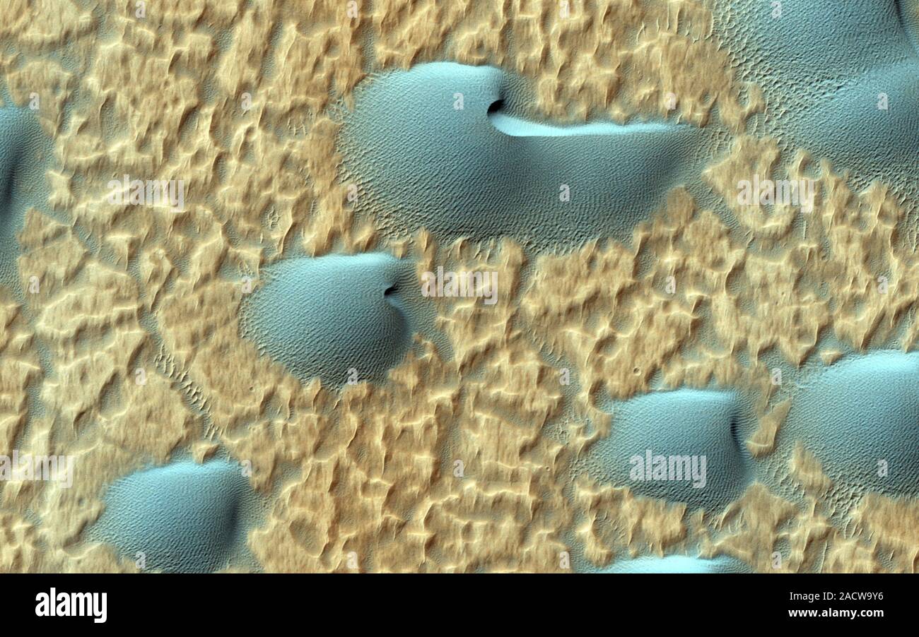Martian sand dunes. Coloured satellite image of sand dunes on the base ...